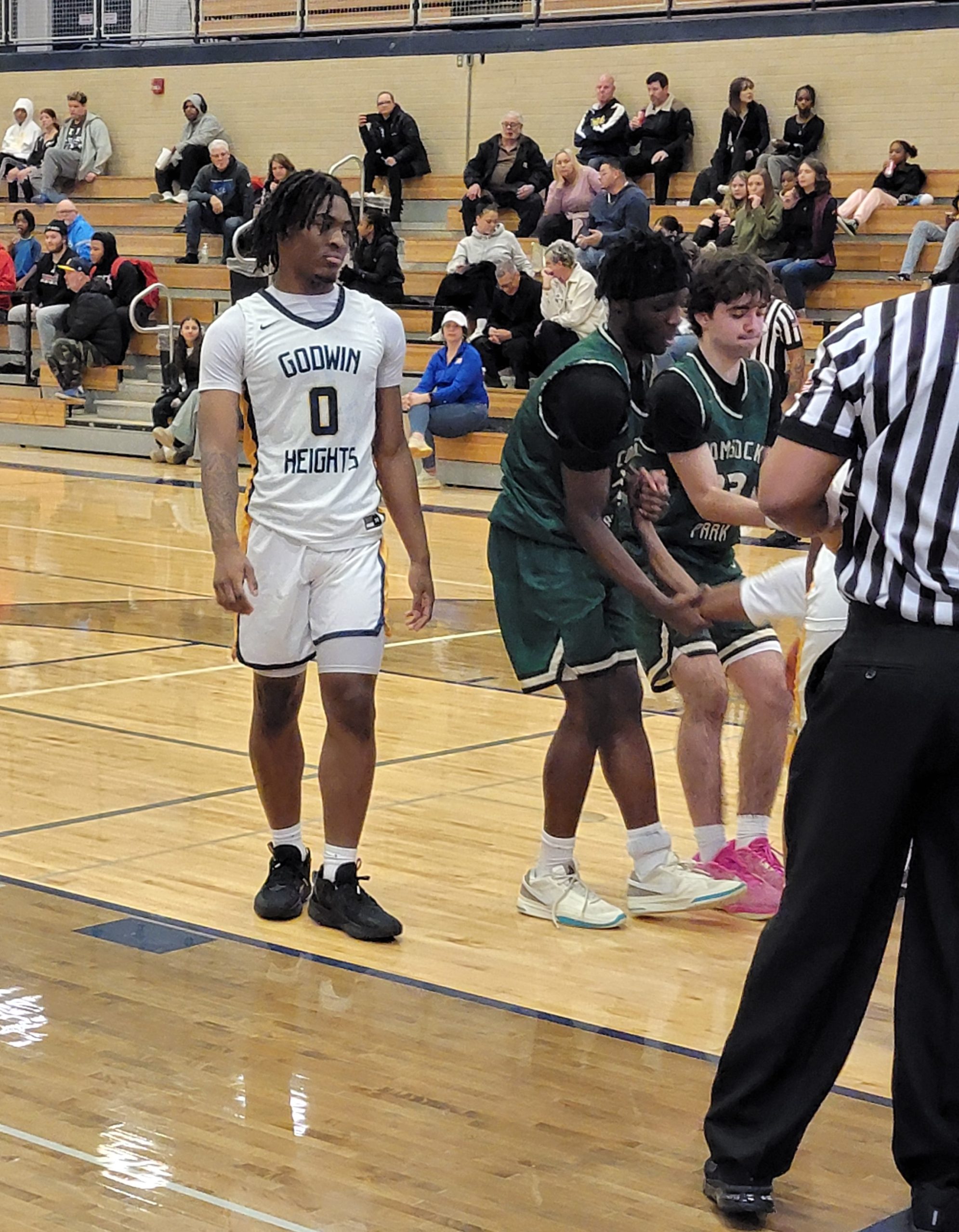 Godwin Heights basketball team continues to make progress, beats ...